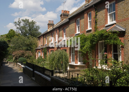 Victorian red brick back to back working class terrace houses with bay ...