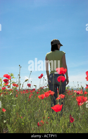 Young woman wearing casual red sweater over isolated background with a ...