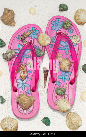 Close up of a pair of sandals on a beach Stock Photo - Alamy