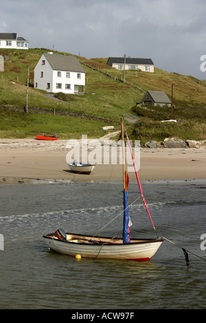Rosbeg, County Donegal, Ireland weather. 24th April 2016. A walker on ...