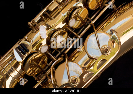 Details of a shiny bronze saxophone close up on white background Stock ...
