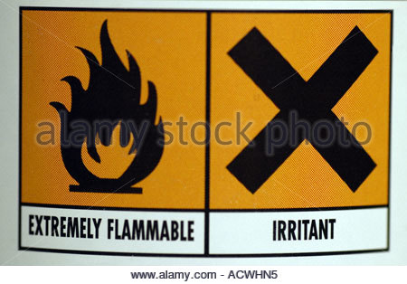 Black cross warning label Irritant on a plastic bottle of bleach Stock ...