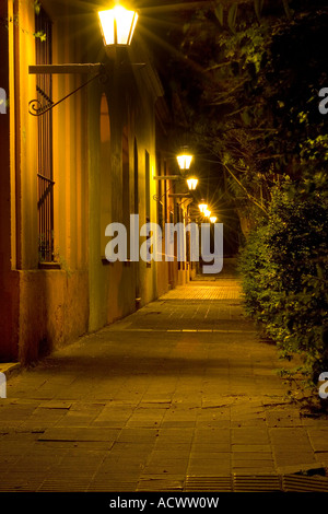 Typical paved streets with colonial lamps for lighting Stock Photo - Alamy