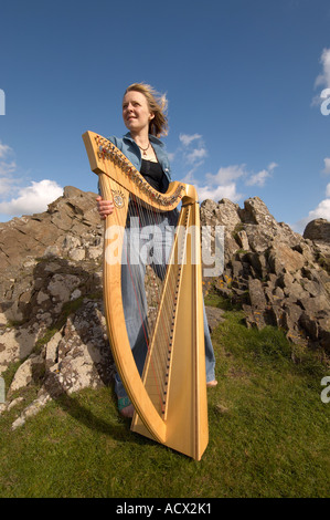 Gwenan Gibbard Welsh traditional harpist with her harp Pwllheli Gwynedd ...