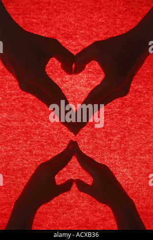 Heart in child and mother hands isolated on white Stock Photo - Alamy