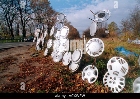 The sale of hub caps on a roadside, Poland Stock Photo - Alamy