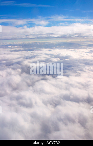 Sky above clouds from airplane window Stock Photo - Alamy