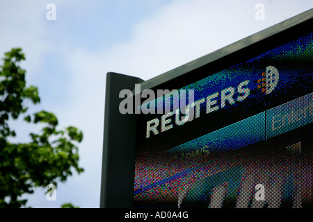 Reuters Head Office and giant screen at Canary Wharf London UK Stock ...