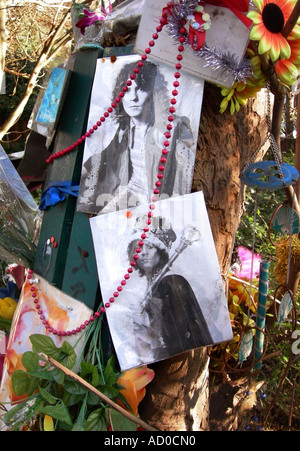Bust of Marc Bolan at the site of his 1977 death in a car crash, with ...