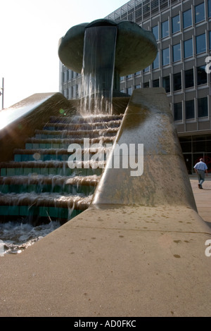 Early spring sunshine on the fountains in Granary Square at Kings Cross ...