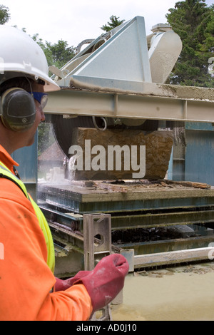 Limestone stone cutting circular saw in operation Stock Photo - Alamy