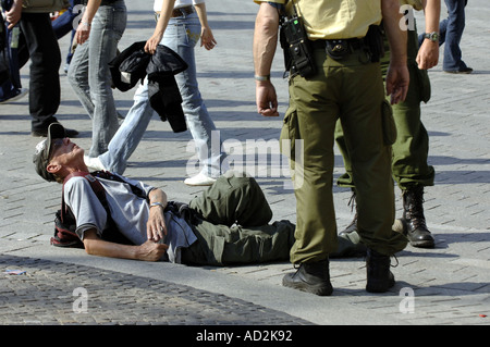 man male polizei police lying lie down drunk incapacitated police ...
