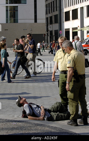 man male polizei police lying lie down drunk incapacitated police ...