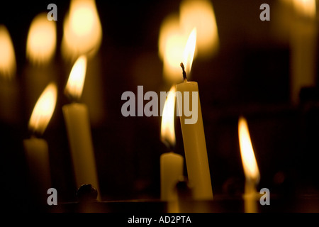 Prayer candles lit in Gloucester catherdral Stock Photo - Alamy