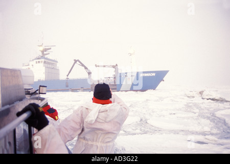 Stimson state trooper boat and skiff in the pack ice Bering Sea Alaska ...