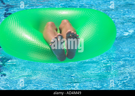 legs on the floater Stock Photo - Alamy