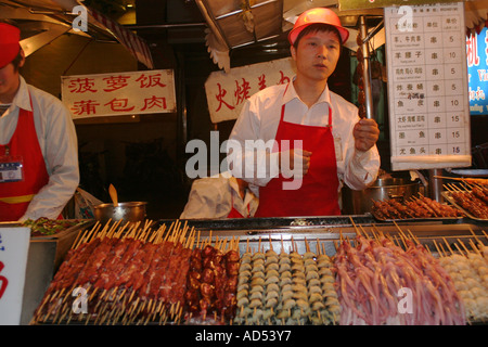Selling snakes and other delicacies at Beijing's night food market off ...