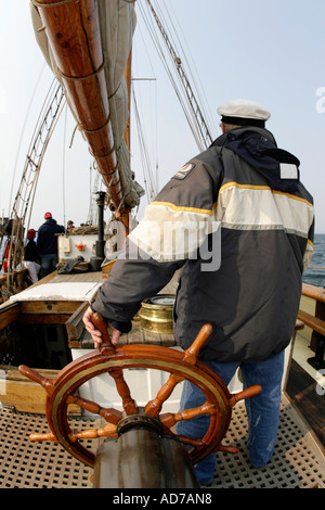 Crew of ship behind steering wheel with chain, Whizgle Dutch News ...