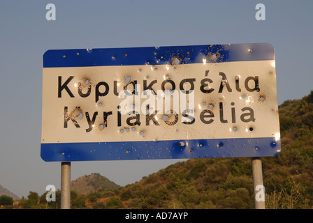 CRETE Town sign with bullet holes Stock Photo - Alamy