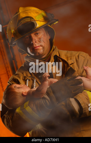 Fireman rescuing a baby Stock Photo - Alamy