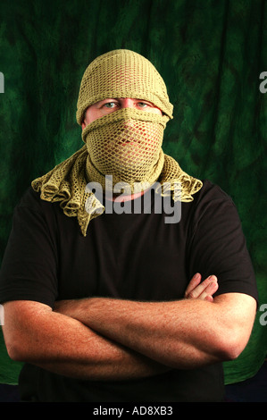 hidden identity scrim and folded arms dsca 4258 Stock Photo - Alamy