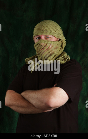 hidden identity scrim and folded arms dsca 4258 Stock Photo - Alamy