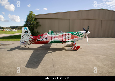 Acrobatic airplane executing tricks in the sky Stock Photo - Alamy