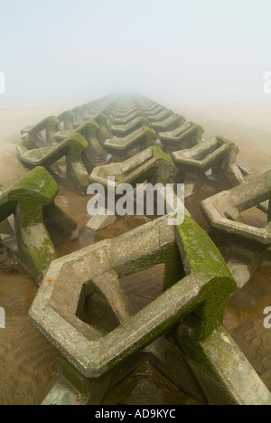 Concrete groynes on New Brighton beach on the Wirral Stock Photo ...
