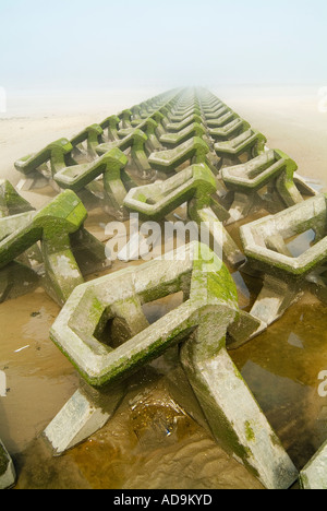 Concrete groynes on New Brighton beach on the Wirral Stock Photo ...