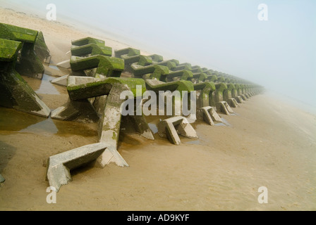 Concrete groynes on New Brighton beach on the Wirral Stock Photo ...