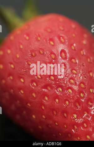 red strawberries on a black background, close-up Stock Photo - Alamy