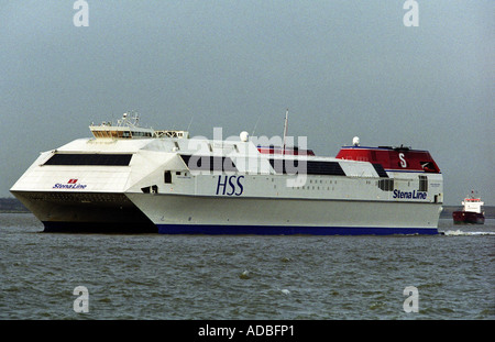 Stena Line HSS Discovery passenger ferry passing a container ship in ...