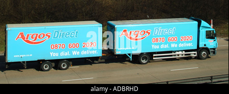 M25 motorway Argos lorry truck towing trailer Stock Photo - Alamy