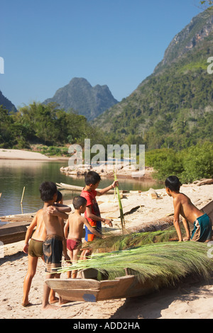Lao Boys on the Riverbank of Mekong River in Louangphrabang Laos Stock ...