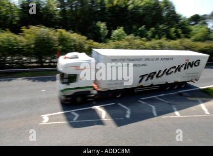 White hgv juggernaut lorry truck driver & blue Furniture Village ...
