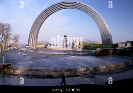 A group of students stand beside the Statue of Friendship in Kiev, Oct ...
