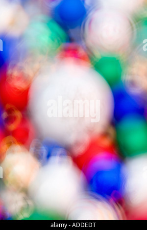 Light bulbs inside with Christmas tree and snow on brown shiny ...