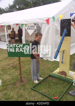Catch the rat summer fete sideshow game, Butley, Suffolk, England Stock ...