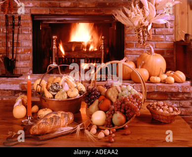 Harvest still life with fireplace ablaze Stock Photo - Alamy
