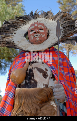 Portrait of Kikuyu dancer in traditional costume of red blanket and ...