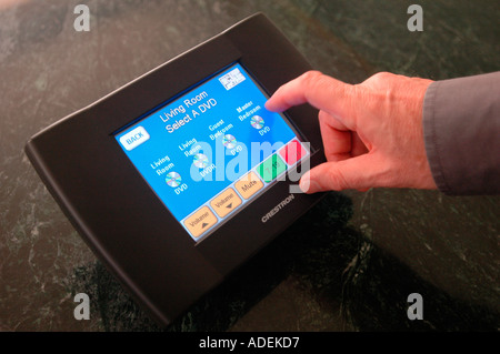 Touchscreen controller for custom home entertainment system Stock Photo ...