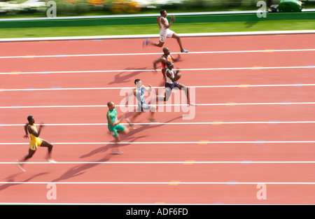 sprinters speeding down the track towards the finish line Stock Photo ...