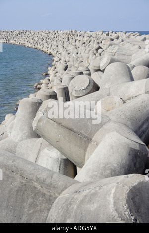 Tetra concrete block used for wave breaker in Malaysia Stock Photo - Alamy