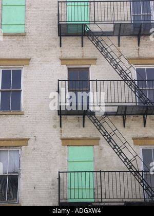 Fire escape stairs mounted to the outside of the back of the Coleman ...
