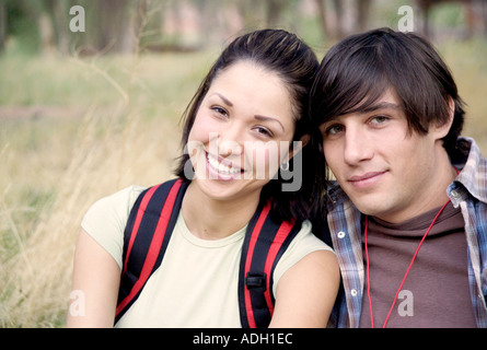 Backpacking couple pose for a portrait Stock Photo - Alamy