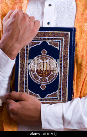 Islamic Holy Book Quran on the market shelf Stock Photo - Alamy