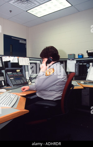 Dispatch at rural Sheriff's Office in Nebraska, USA. Dispatcher taking ...