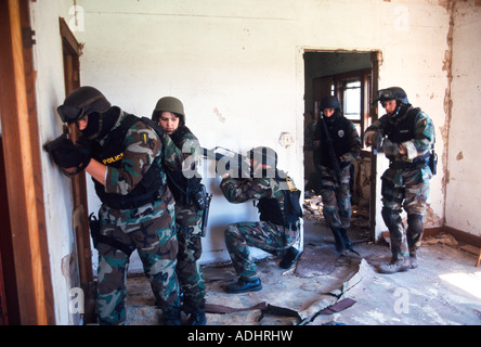 SWAT training. Moving in formation approaching a building Stock Photo ...