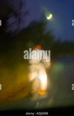 Drivers view through windscreen of headlights, distorted blurry fuzzy ...