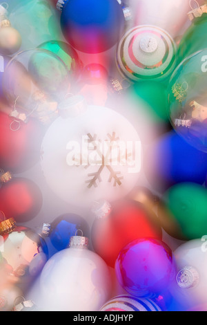 Light bulbs inside with Christmas tree and snow on brown shiny ...